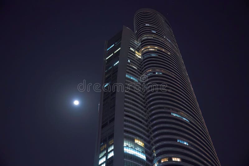 Skyscraper and Moon at Night Editorial Photography - Image of dubai ...