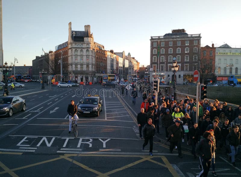 Dublin, Ireland - January 20 2017: People Crossing at an Intersection ...