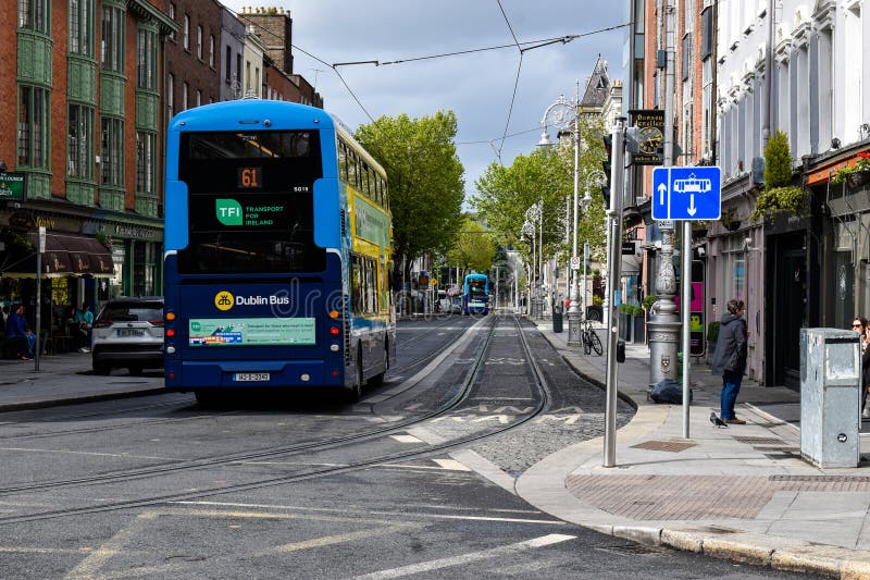Blue Double-decker Bus Driving on a Busy Street Alongside Other ...