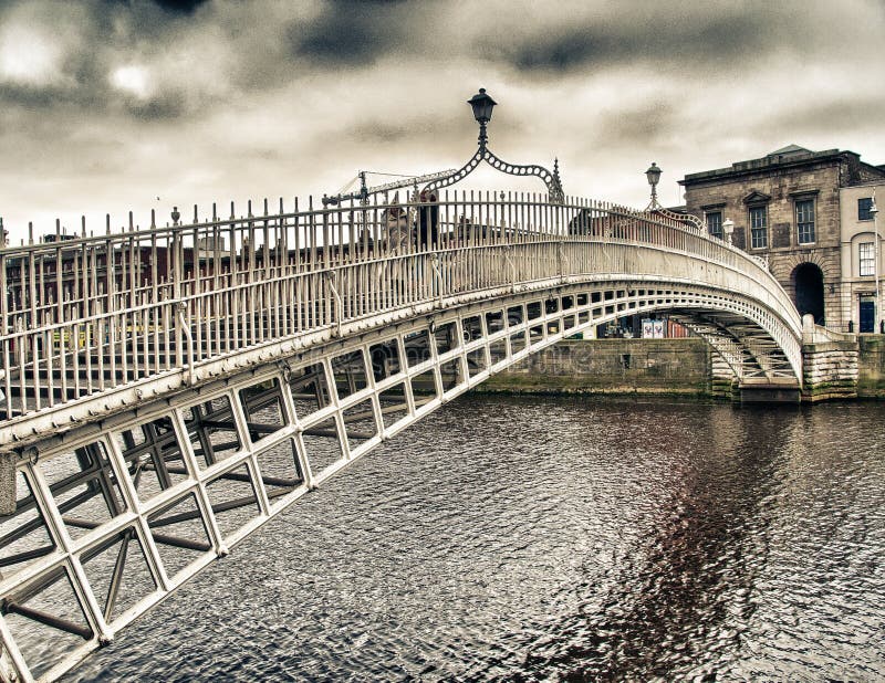 Dublin, Ireland. Waterfront and Historic Ha Penny Bridge Editorial ...