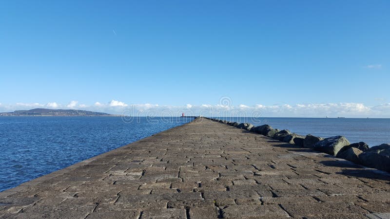 Dublin pier and lighthouse stock image. Image of lighthouse - 91165447