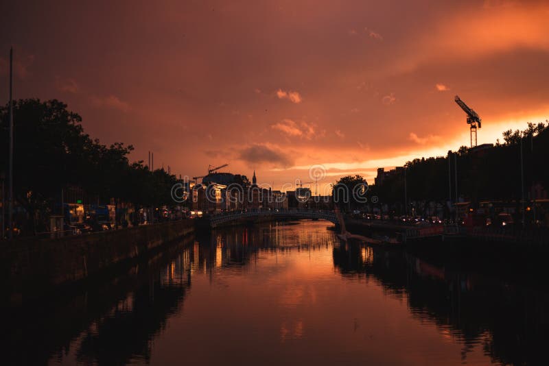 Dublin`s Cityscape during a Colorful Sunset with Clouds and Seagulls ...