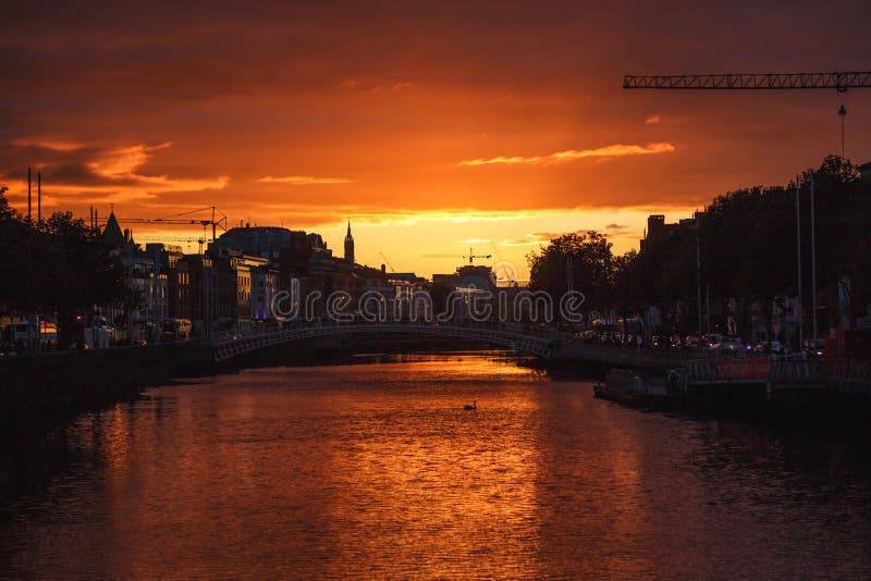 Dublin`s Cityscape during a Colorful Sunset with Clouds and Seagulls ...