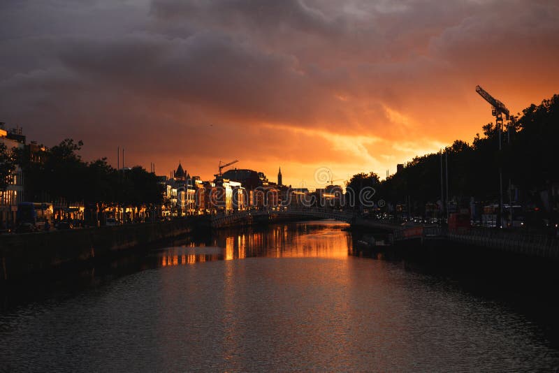 Dublin`s Cityscape during a Colorful Sunset with Clouds and Seagulls ...