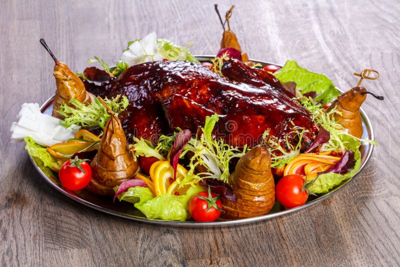 Duck baked with pear stock photo. Image of plate, closeup - 130254518