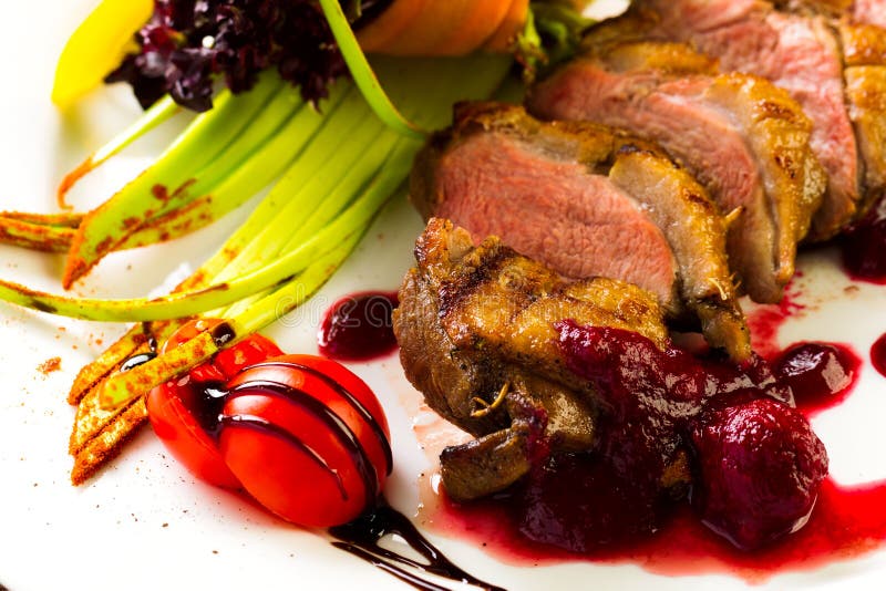 Duck Baked with Vegetables and Herbs Stock Photo - Image of closeup ...