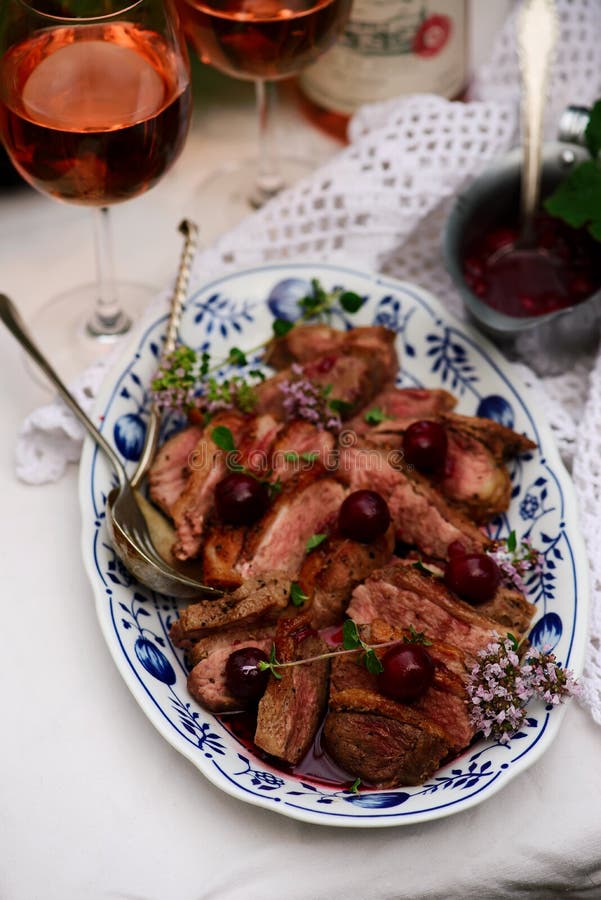 Duck Breast with Cherry Sauce..style Rustic Stock Image - Image of ...