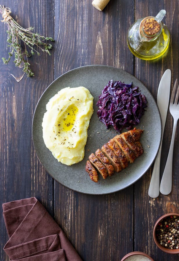 Duck Breast with Mashed Potatoes and Red Cabbage Stock Photo - Image of ...