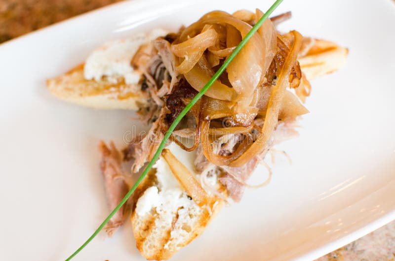 Duck Confit Poutine Dish on Wood Table Stock Image - Image of curd ...
