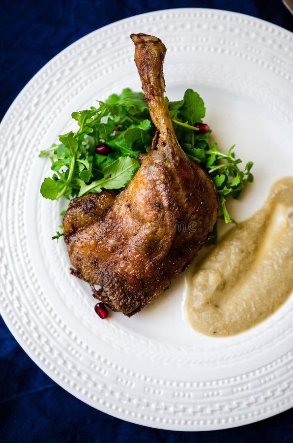 Duck Confit Poutine Dish on Wood Table Stock Image - Image of curd ...