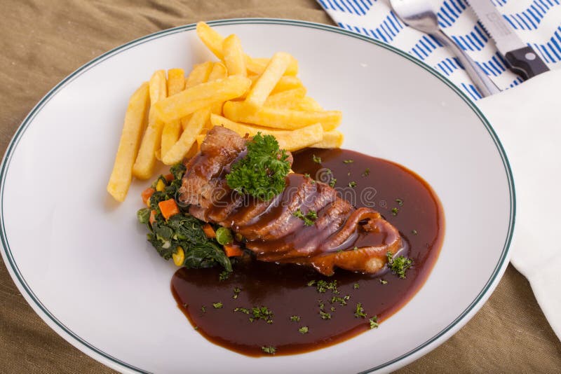 Duck confit stock photo. Image of vegetable, onion, fried - 84017510