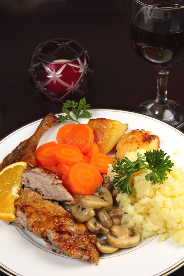 Duck dinner vertical stock image. Image of mushrooms - 15782149