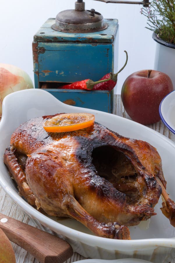 Duck with Dumplings and Pickled Plum Stock Photo - Image of food, herbs ...