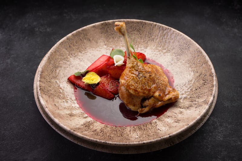 Duck Leg with Baked Pear and Orange in Cherry Sauce Stock Photo - Image ...
