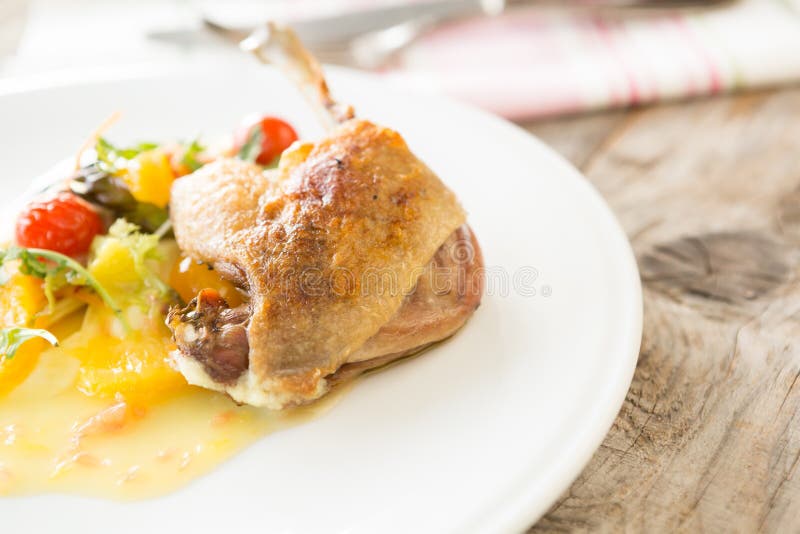Duck leg confit stock image. Image of meal, orange, festive - 73594371