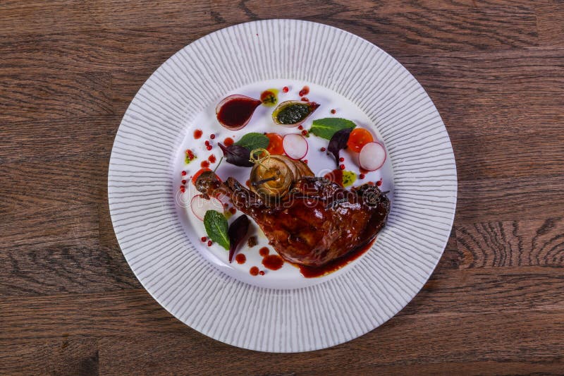 Duck leg with pear stock image. Image of roast, potatoes - 128110985