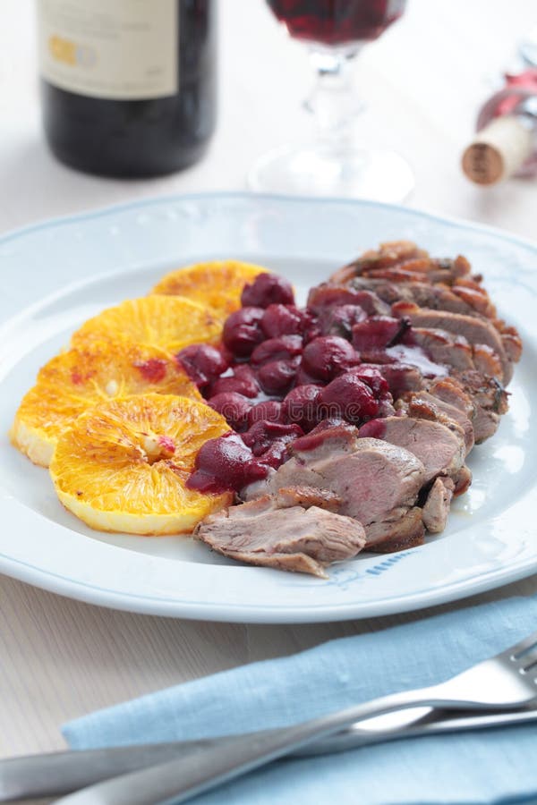 Duck Meat with Orange and Cherry Sauce Stock Photo - Image of lunch ...