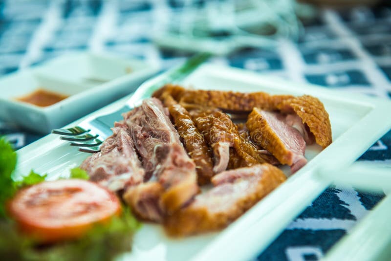 Duck on white plate stock image. Image of roast, healthy - 263091749