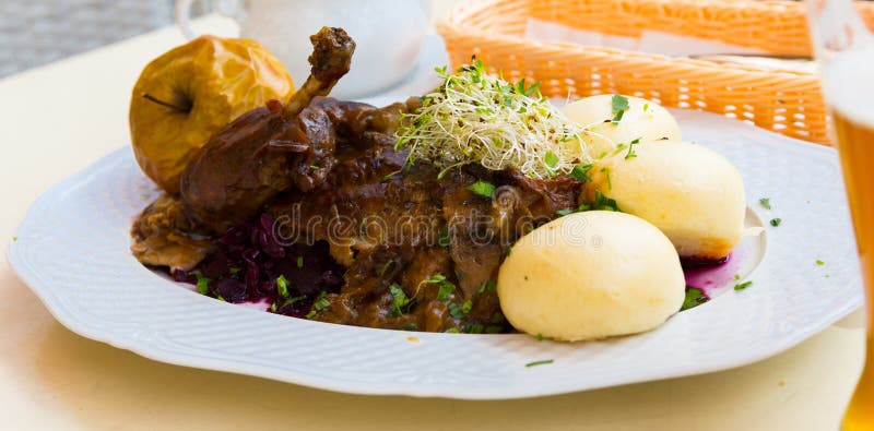 Duck with Yeast Dumplings and Blue Cabbage Stock Photo - Image of ...