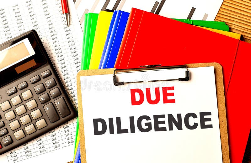 DUE DILIGENCE Text Written on Paper Clipboard with Chart and Calculator ...