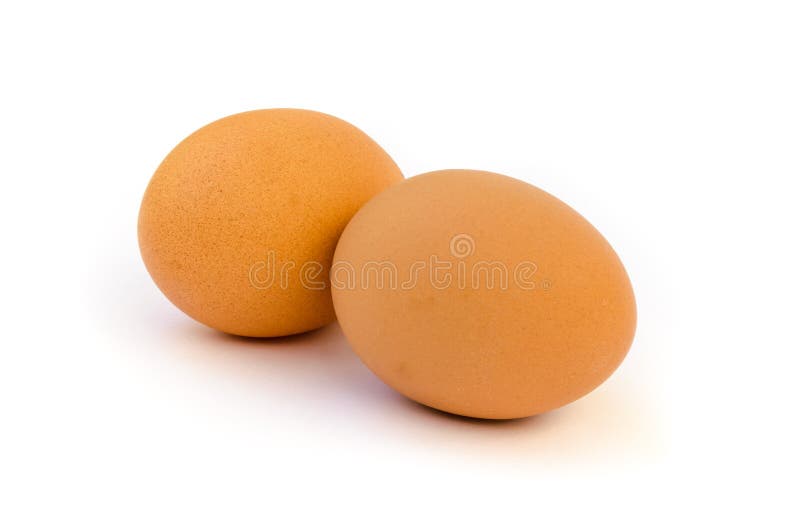 Due Uova Marroni Isolate Su Fondo Bianco Fotografia Stock - Immagine di ...