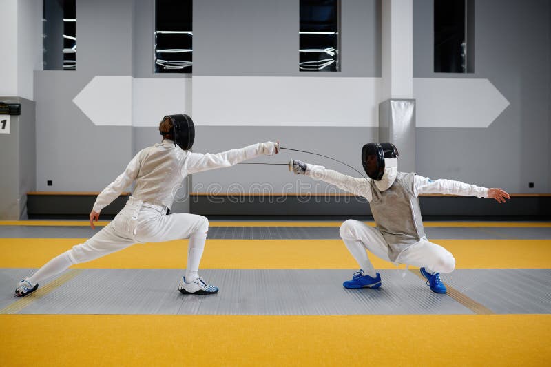 Swordsman Standing in Fencing Lunge during Training Fight in Fencer ...