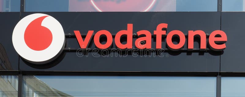 Vodafone sign and shop editorial photography. Image of public - 164882912