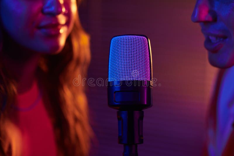 Duet Singing in Microphone stock photo. Image of female - 300737676