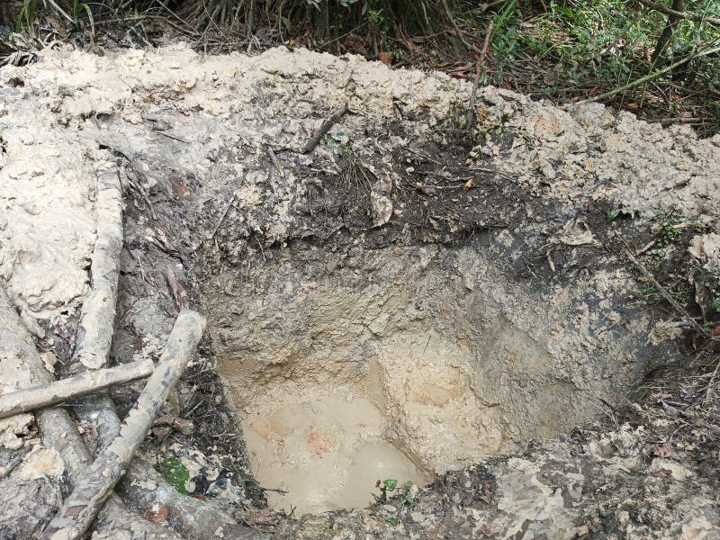 Dug Muddy Ground into a Well in the Forest Stock Image - Image of ...