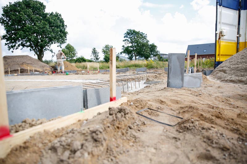 Dugged Holes Filled with Concrete on a Construction Site. Building ...