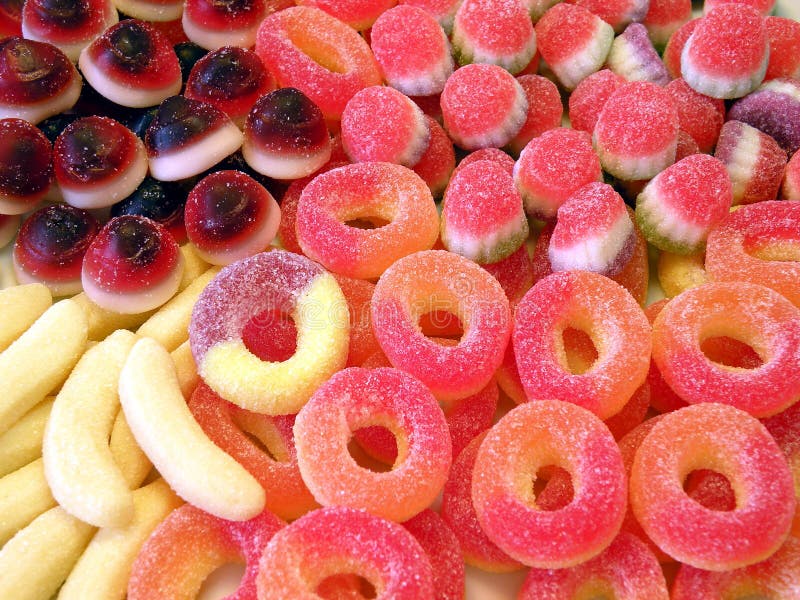 Dulces rojos de Yelly imagen de archivo. Imagen de fondo - 10452887