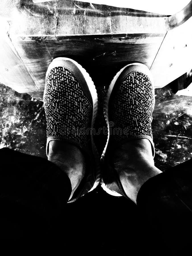 Dull shoes in a dark room stock image. Image of texture - 229369999