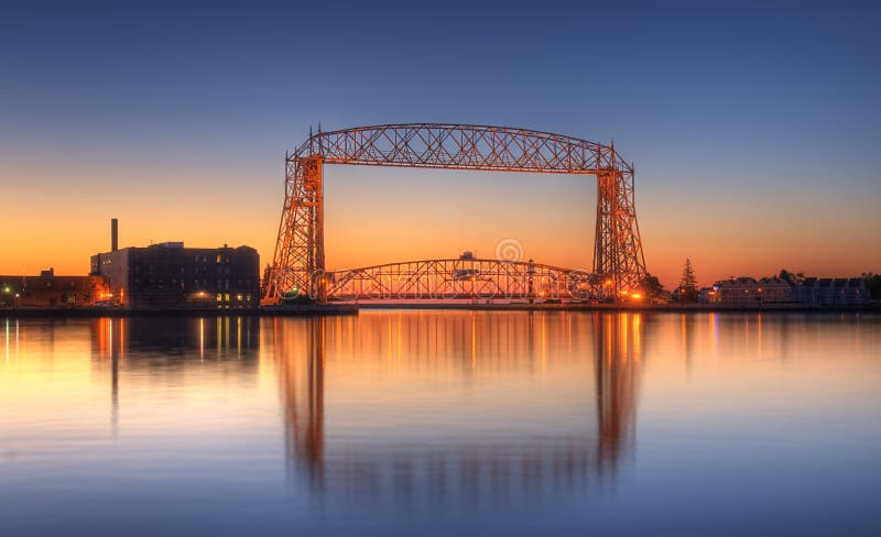 Boardwalk with Rocks Around and People Walking with Duluth Aerial Lift ...