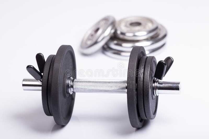 Barbell Discs on a Black Background Stock Photo - Image of iron ...