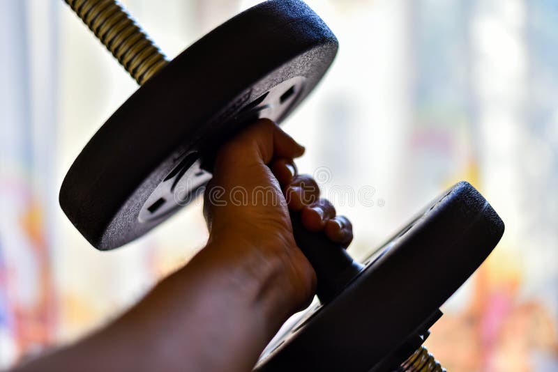 Dumbbell in hand stock image. Image of flew, grapes - 193503667