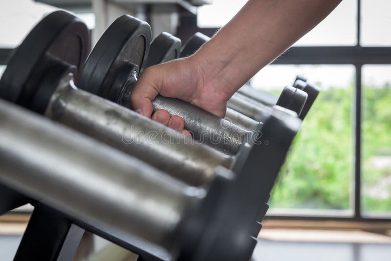 Man's Hand Takes Heavy Dumbbell Gym Stock Photos - Free & Royalty-Free ...