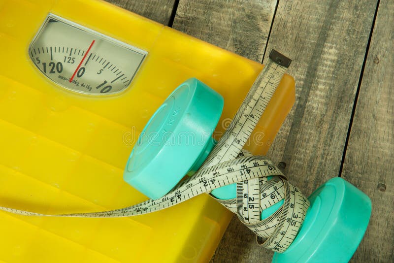 Dumbbells and Weight Scale Machines Stock Image - Image of care ...