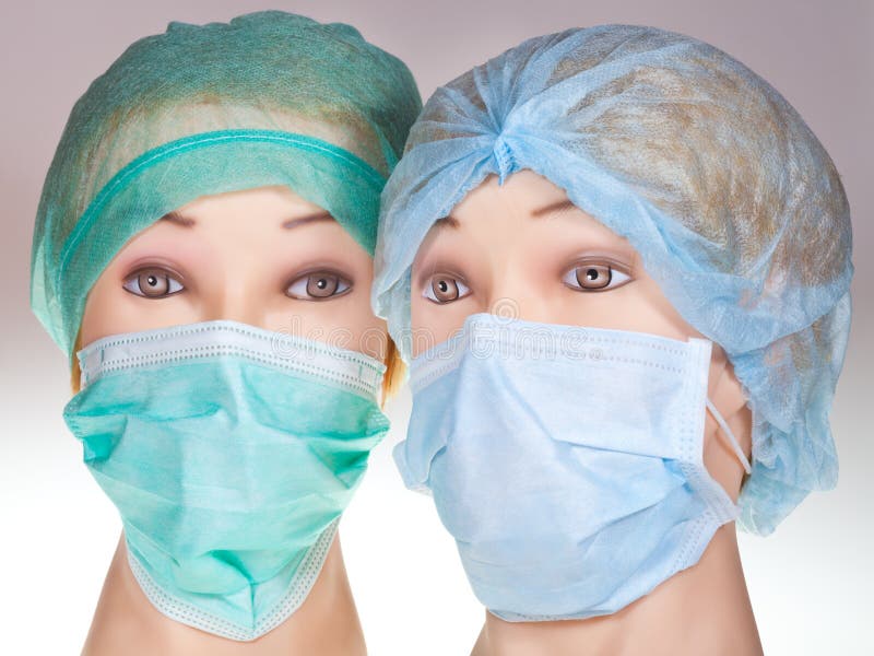 Dummy Doctor Heads Wearing Textile Surgical Cap and Mask Stock Photo ...