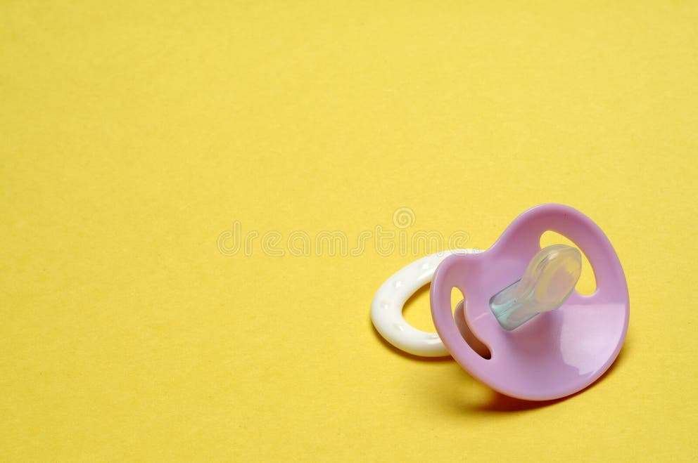 Dummy Pacifier on Yellow Background Stock Image - Image of dummy ...