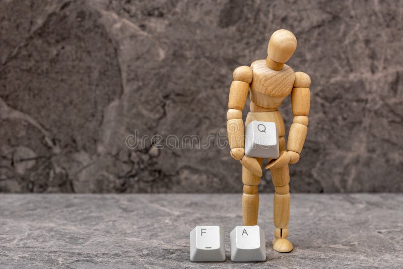 Dummy Puts Computer Keyboard Key with Letter Q from the Word FAQ Stock ...
