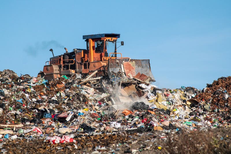 The dump and the bulldozer editorial image. Image of ecological - 63669305