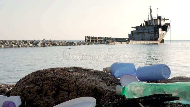 Dump Garbage on the Beach Near the Sea, Rust Ship in the Sea ...