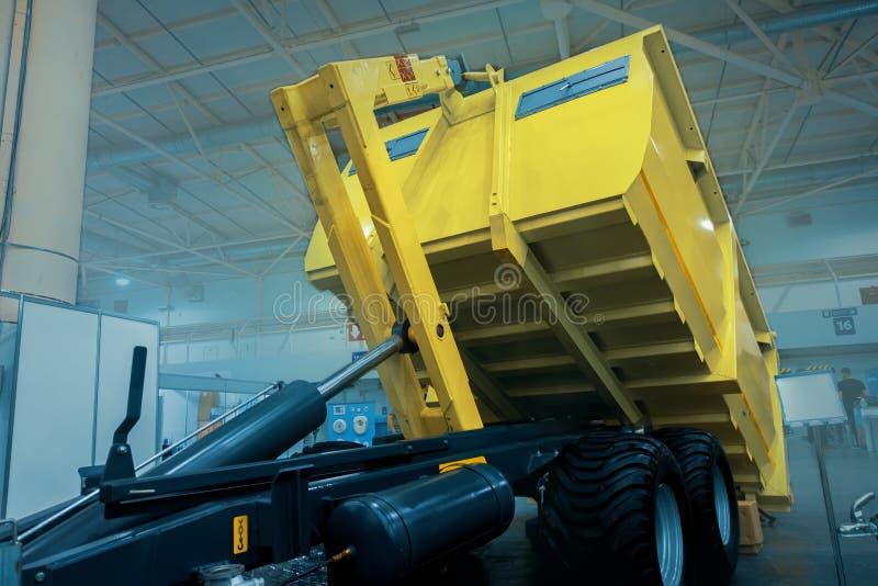 Dump Truck. Self-unloading Cargo Vehicle, with a Body Mechanically ...