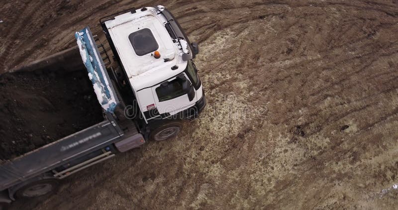 Dump Truck Transports Soil on Construction Site. Top View Dump Truck ...
