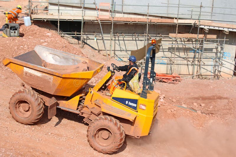 Dump Truck Tipping on a Road Construction Site Editorial Stock Image ...