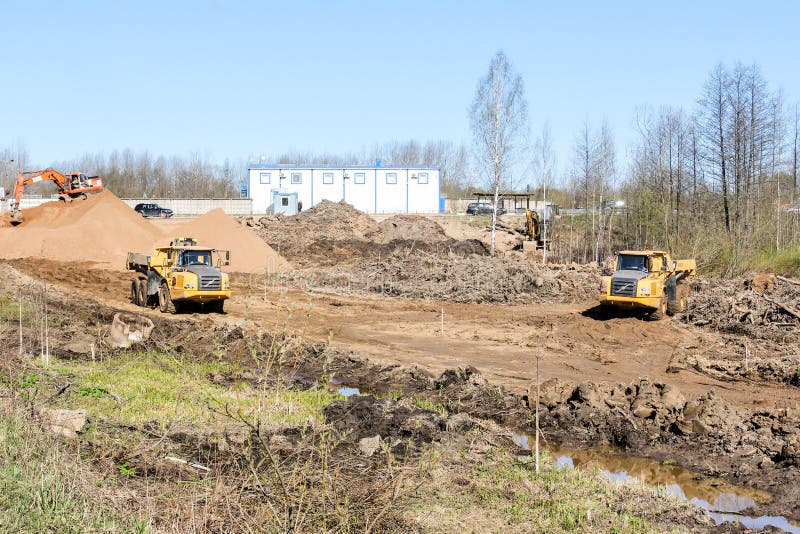 Dump trucks carrying soil editorial photo. Image of clearing - 182338001
