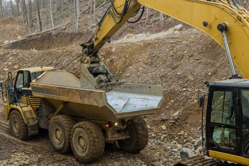 Truck Loads of Concrete Poured into the Concrete at a Construction in a ...