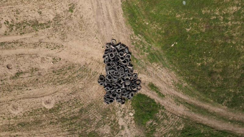 Dump of Unwanted Tires Lying on the Ground in an Open Field Stock Video ...