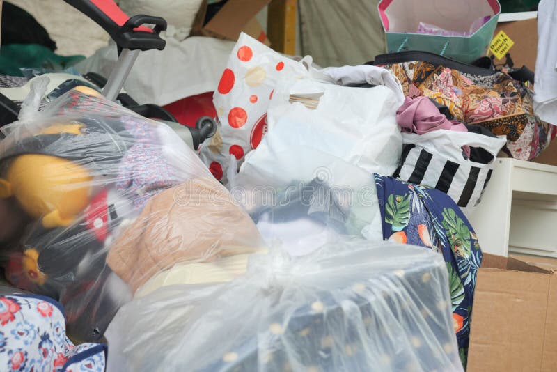 Dumped Donated Items in a Large Container Outdoor Stock Photo - Image ...