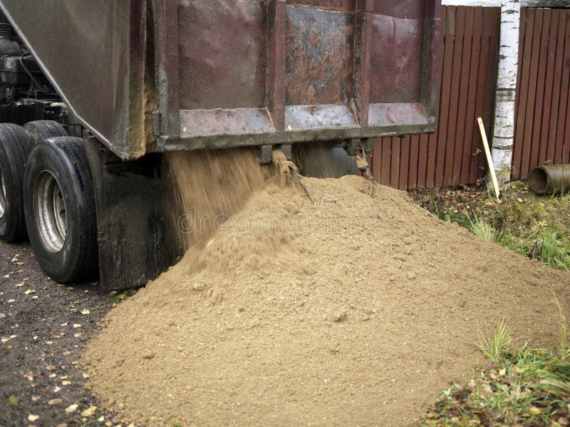 Dumper offloading sand stock photo. Image of construction - 160970918